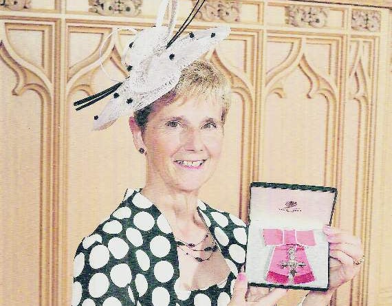 Proud Judith receives her MBE at ceremony | cambrian-news.co.uk