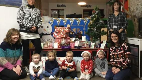 Children hand gifts to the older generation | cambrian-news.co.uk