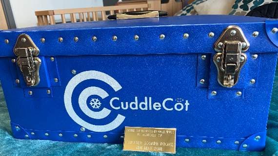 Couple buy cuddle cot in memory of baby boy | cambrian-news.co.uk
