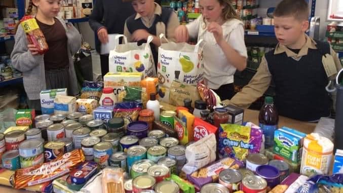 Plascrug pupils help Penparcau foodbank | cambrian-news.co.uk