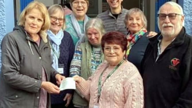 New Quay Memorial Hall volunteers donate £200 to Aberaeron Food Bank ...