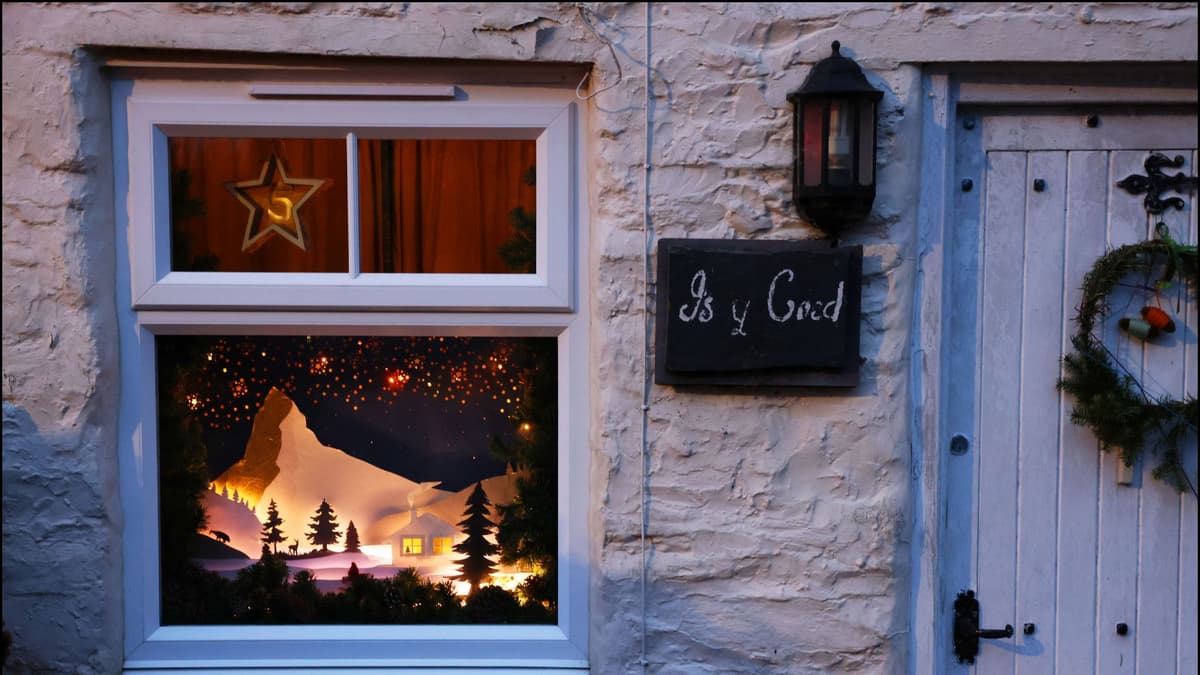 Advent windows unite tiny village with festive family-friendly art ...