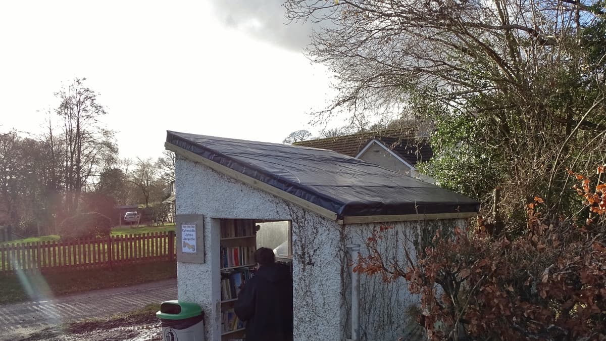 Community transforms disused bus shelter into library | cambrian-news.co.uk