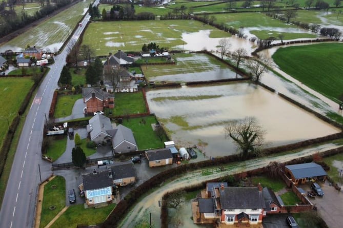 Pause to plans for 29 new homes in mid Wales over flooding fears ...