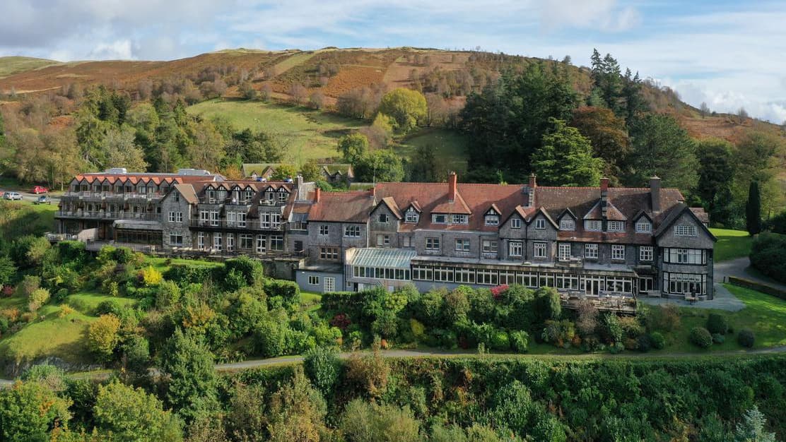 Powys hotel for sale is historic building sitting above a lake ...